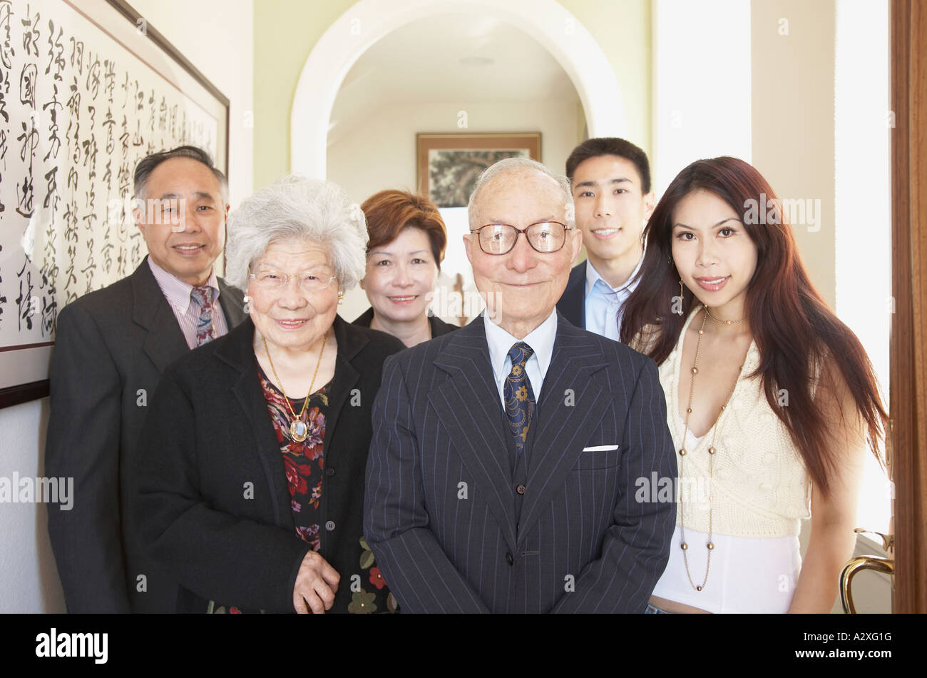 Multi generational Asian family smiling indoors Stock Photo - Alamy