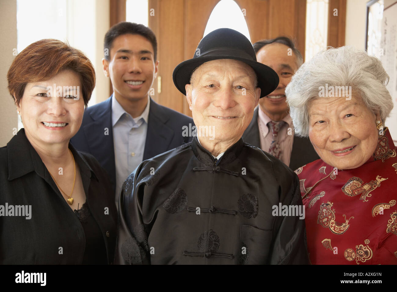 Multi generational Asian family smiling Stock Photo - Alamy