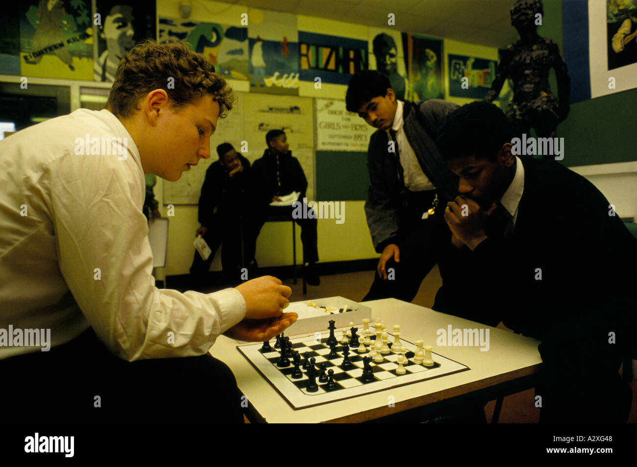 moss side manchester school children playing chess 1993 Stock Photo - Alamy