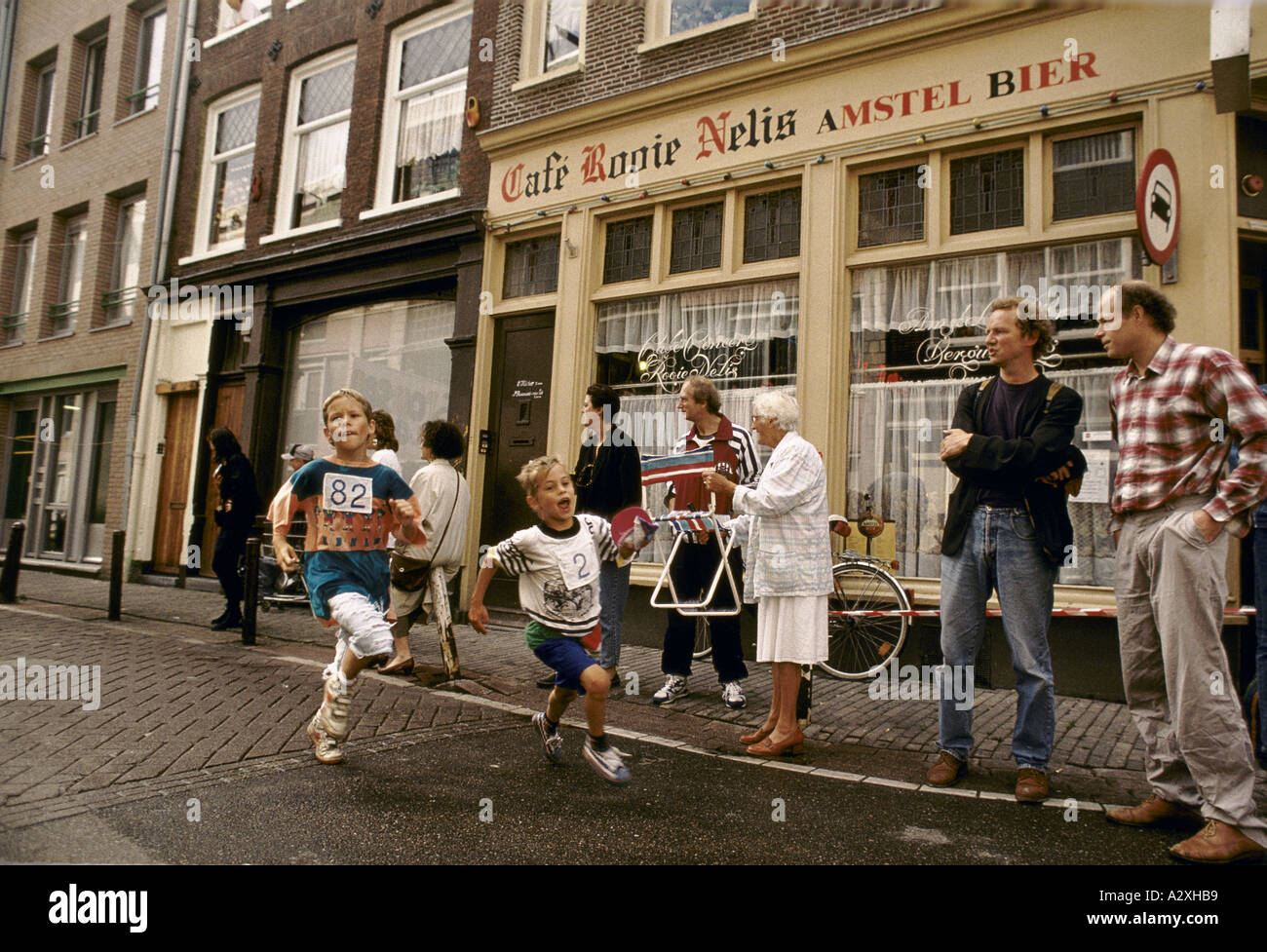 children racing in the street amsterdam 1994 Stock Photo - Alamy