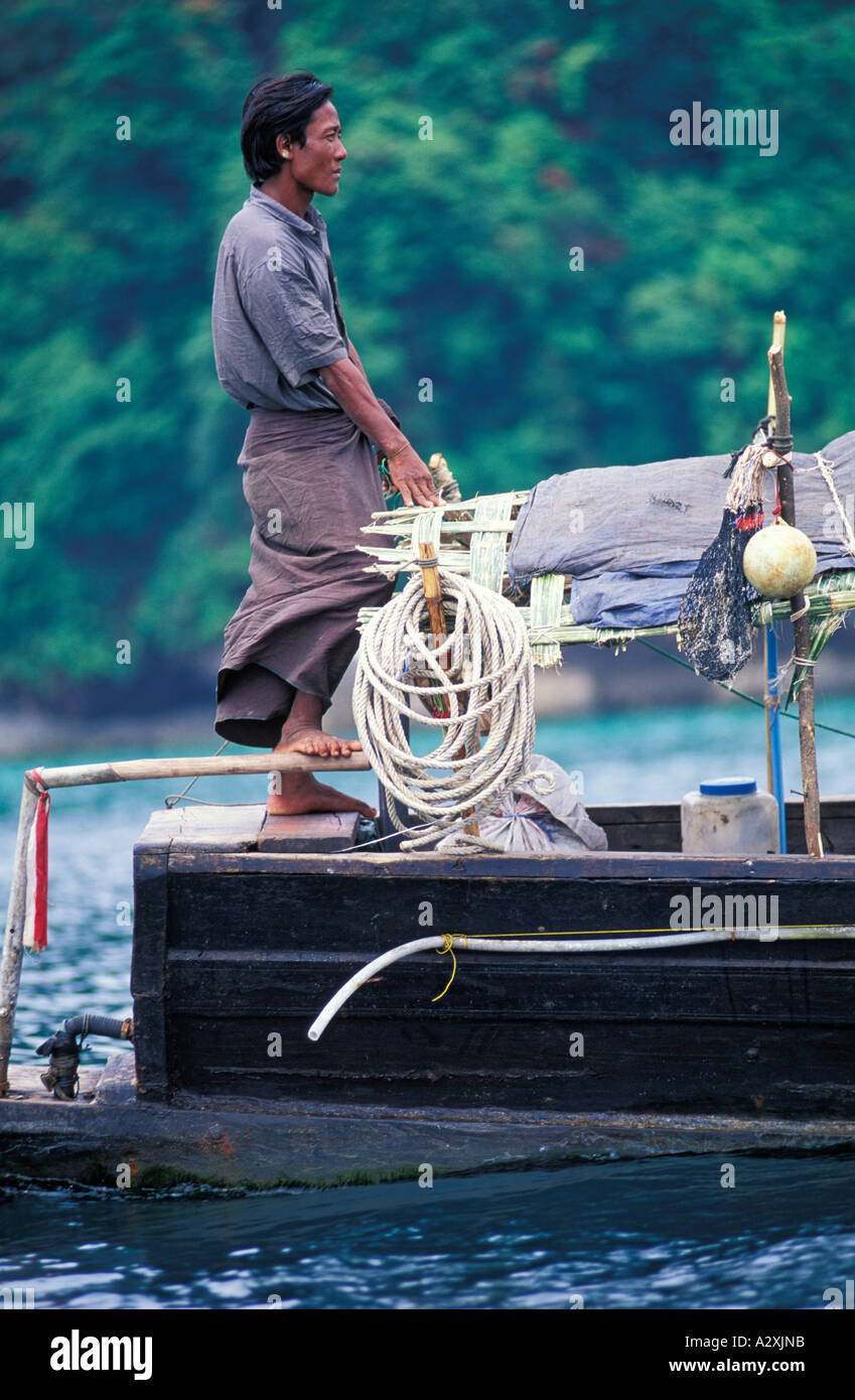 Myanmar Burma Moken Tribe sea gypsy steering Kanbang fishing boat ...