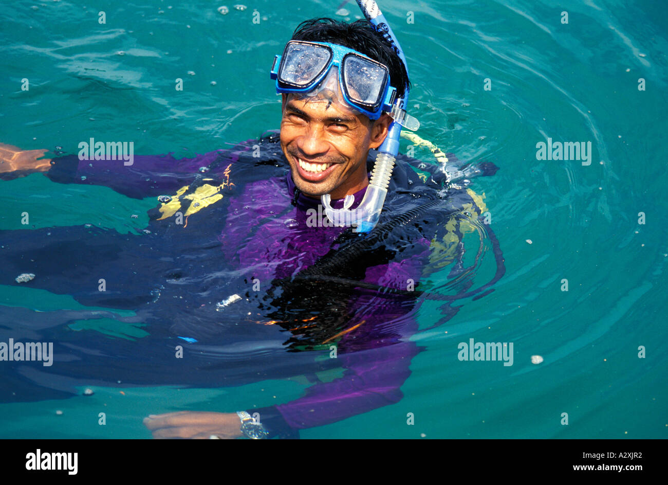 ASIA MYANMAR BURMA Burmese scuba diver diving in the Mergui Archipelago ...