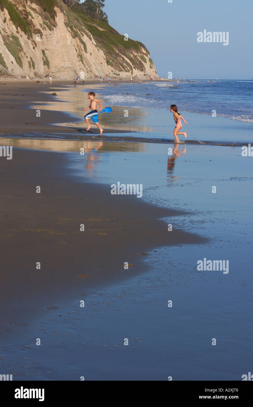 Children Playing on Beach Stock Photo - Alamy