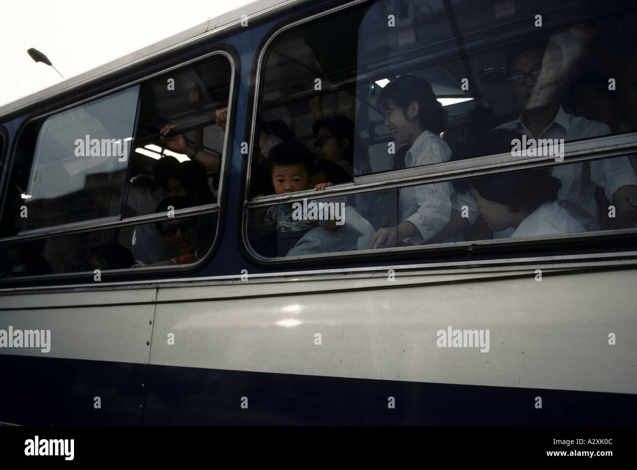 packed bus in canton china full of passengers Stock Photo - Alamy