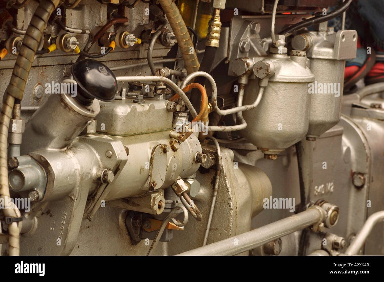 Engine of an old-timer tractor Stock Photo - Alamy