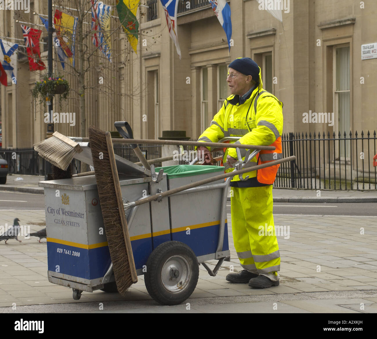 Street cleaner in Trafalgar Square London Stock Photo - Alamy