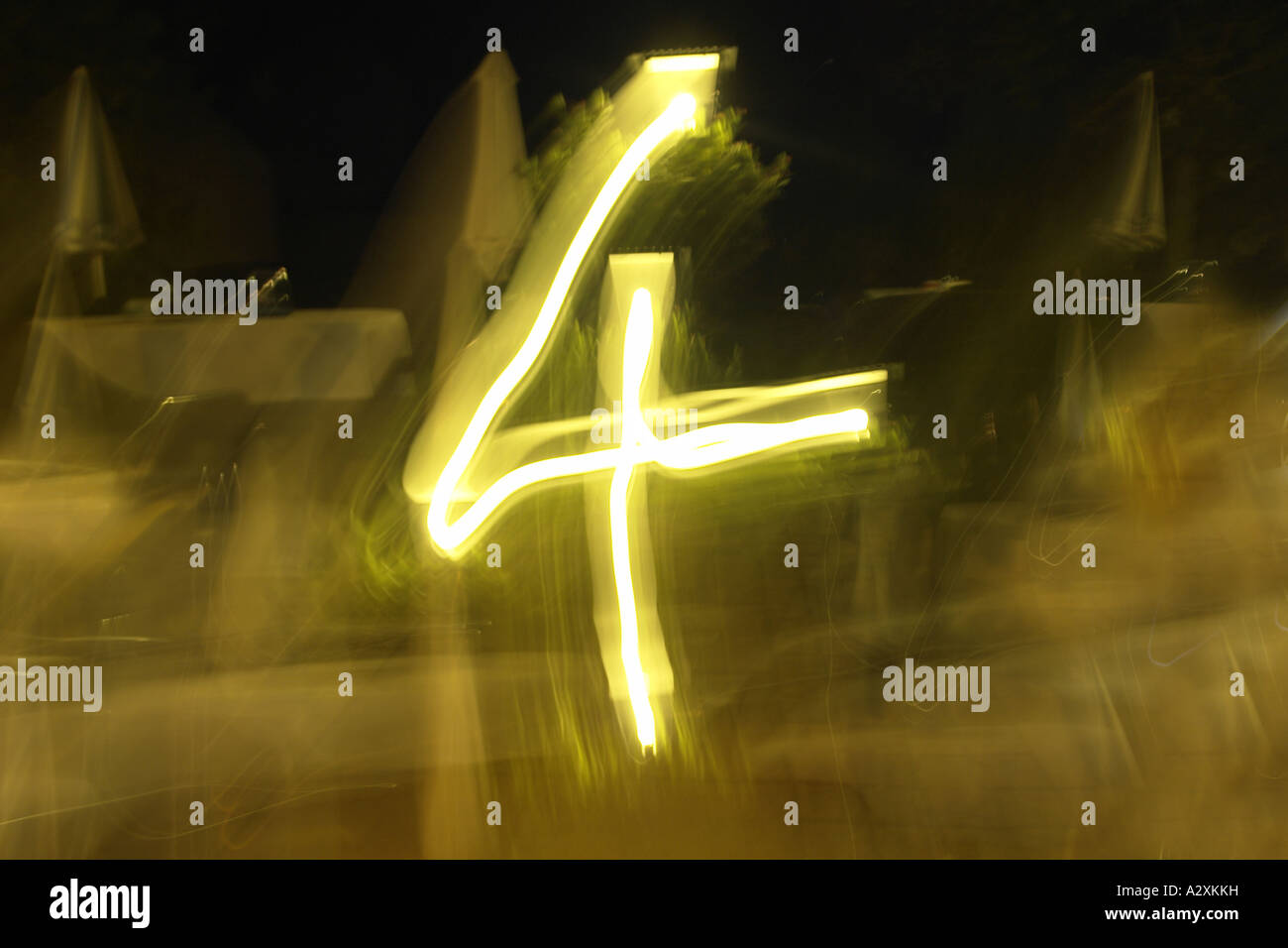 Illuminated number four Stock Photo - Alamy