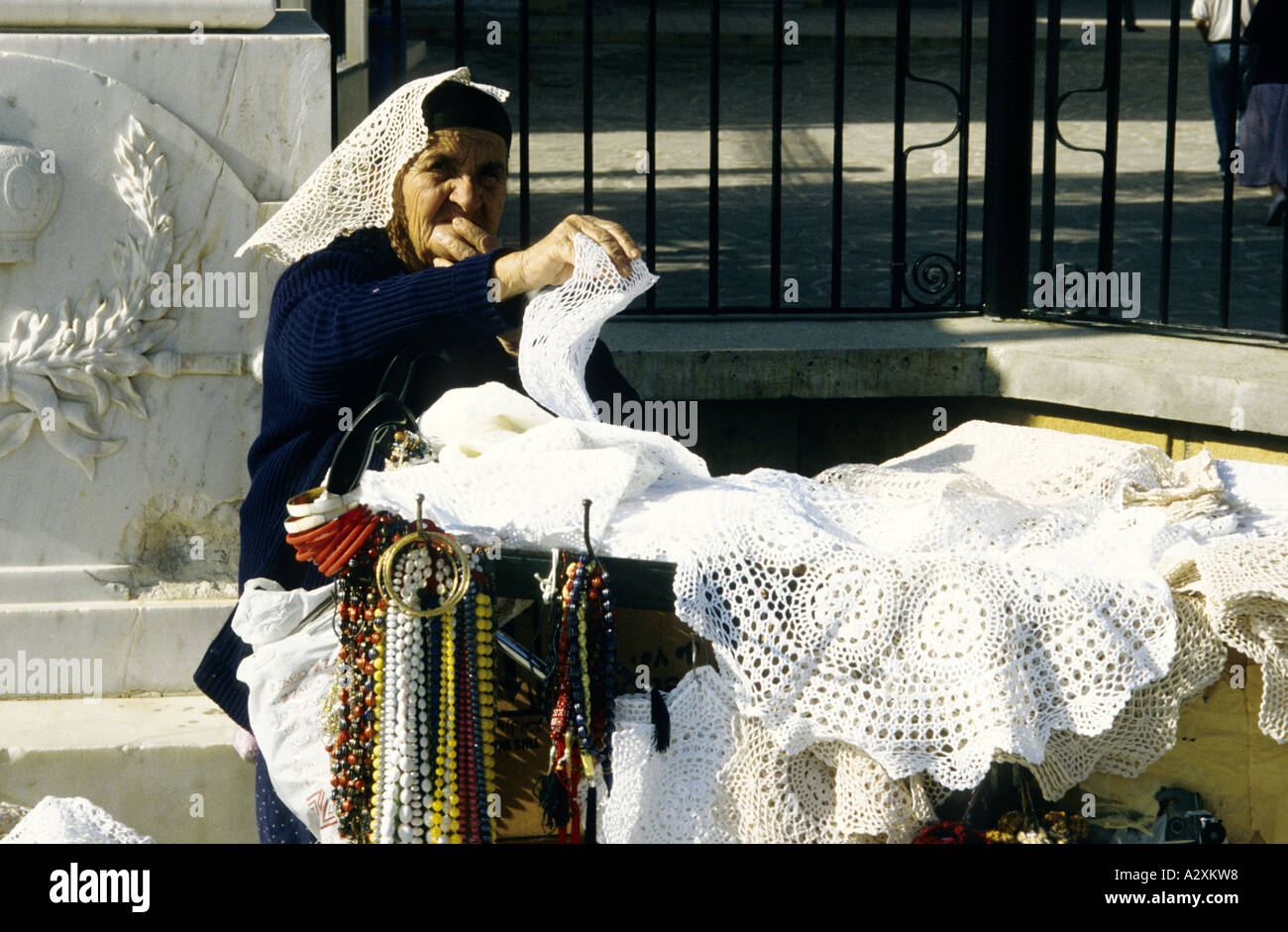 Cypriot old woman selling handicrafts, Limassol, Cyprus Stock Photo - Alamy