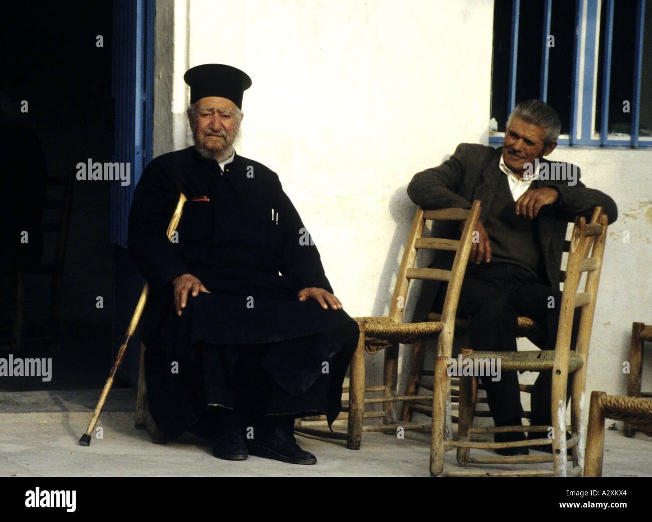 Elderly greek man sitting hi-res stock photography and images - Alamy
