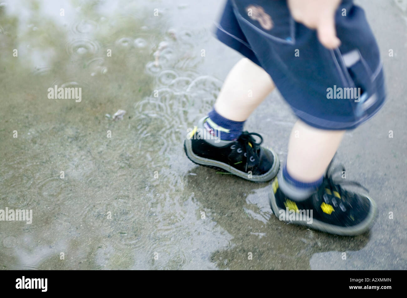 Splashing In Puddle Stock Photos & Splashing In Puddle Stock Images - Alamy