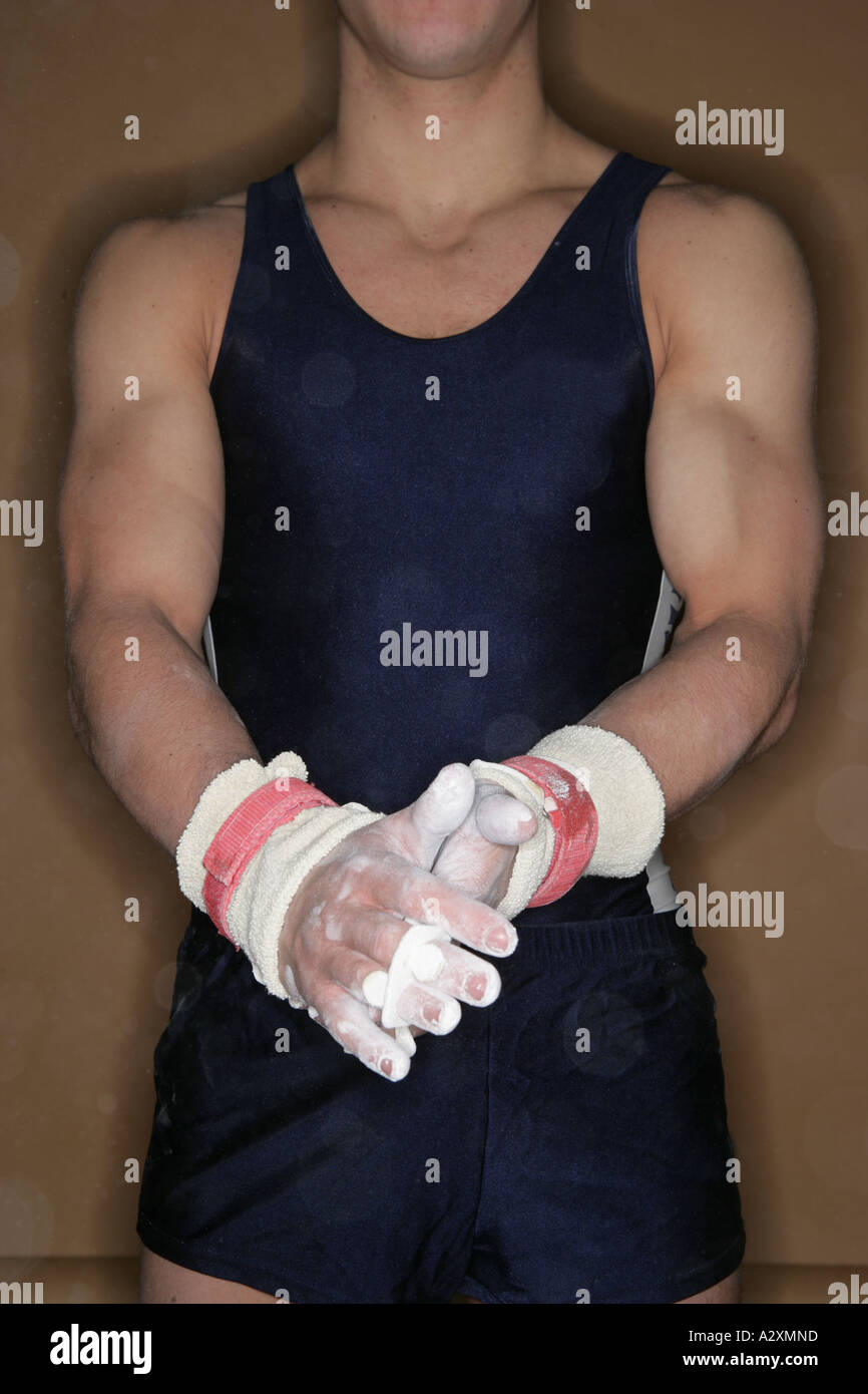 male gymnast chalking hands Stock Photo - Alamy