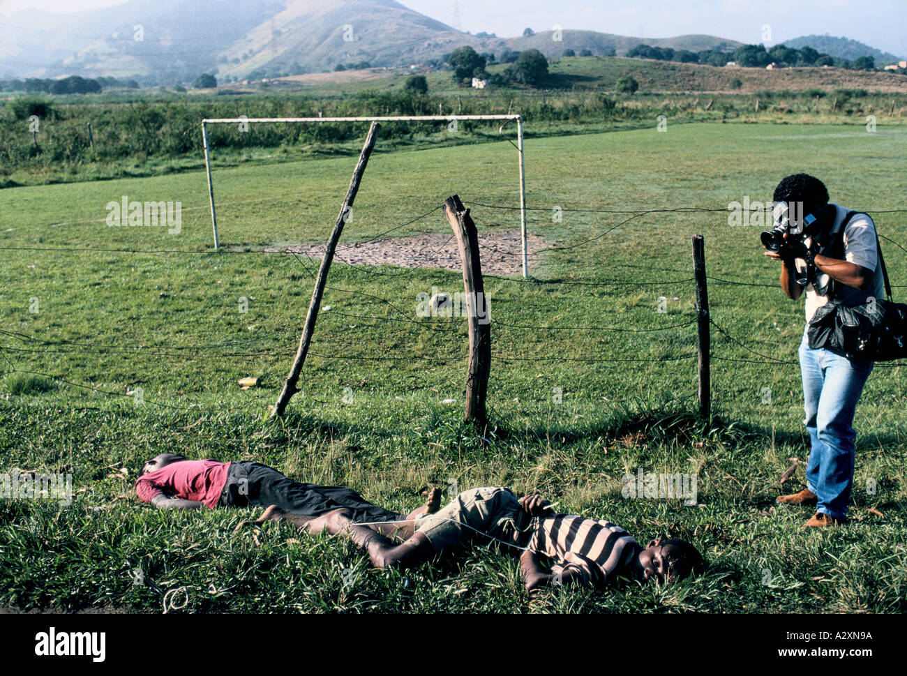 Rio de Janeiro - A reporter with O Povo, Rio's new crime daily covers ...