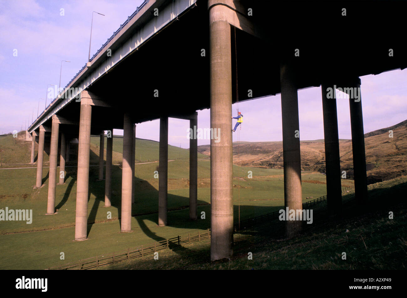 M62 motorway UK : A road maintenance crew inspects the structure of one ...
