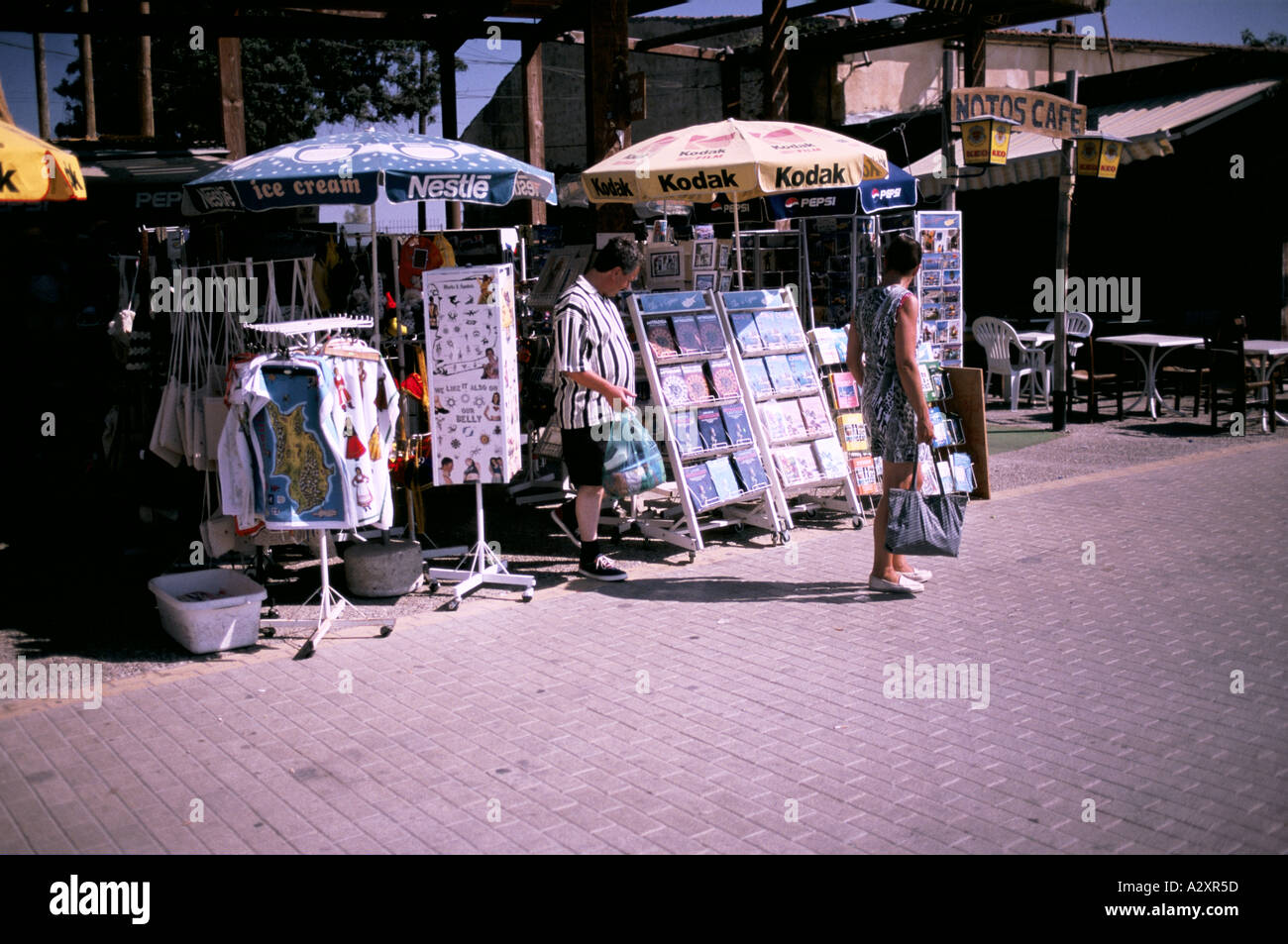 people browsing in the souvenir shop in paphos harbour cyprus 1999 ...