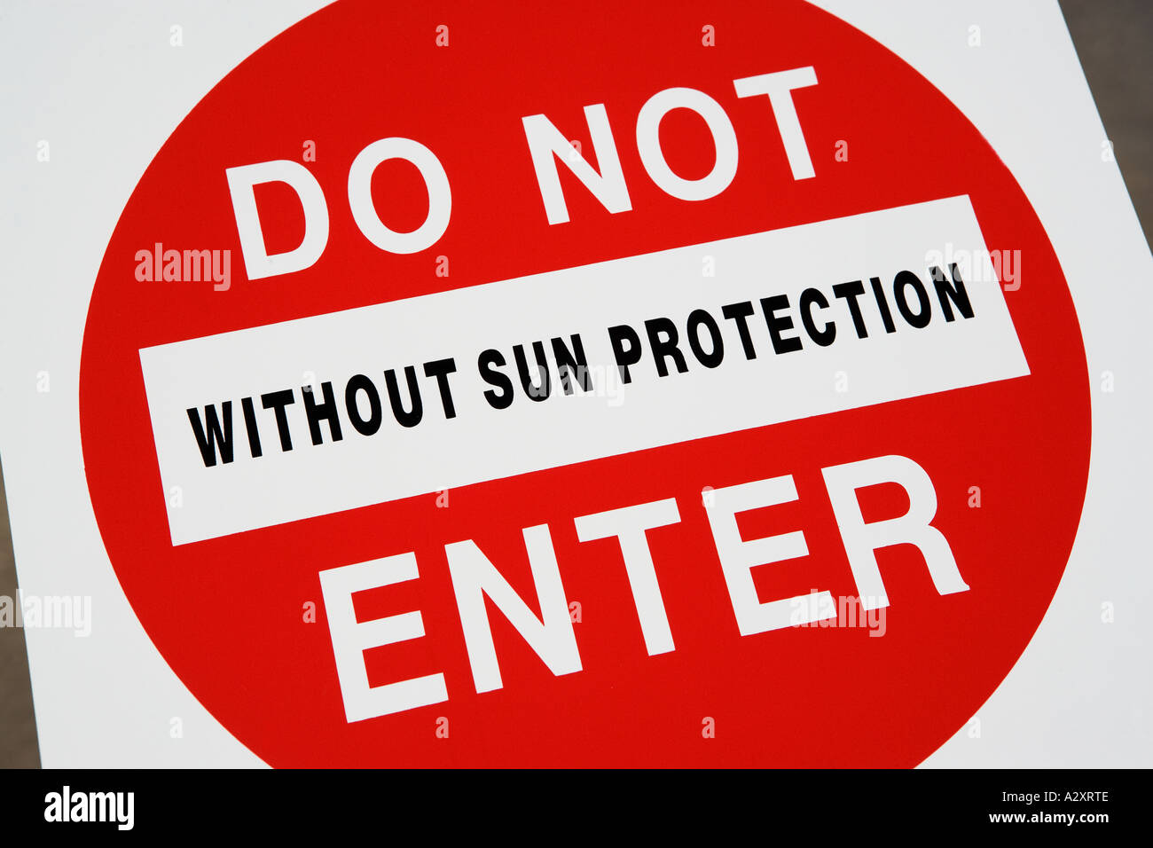 SWIMMING POOL AND DO NOT ENTER WITHOUT SUN PROTECTION SIGN Stock Photo ...