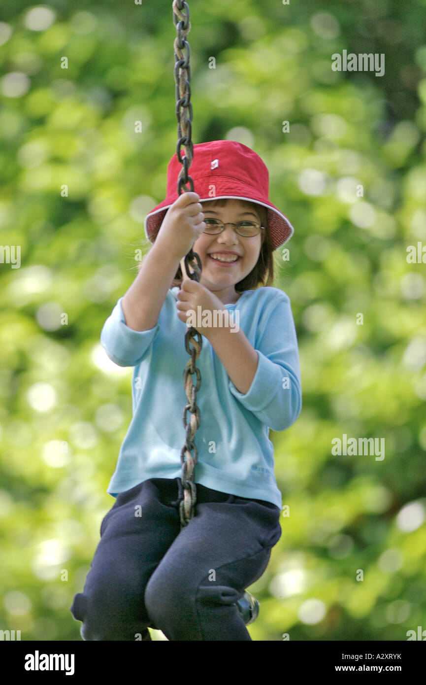 Girl on flying fox rope slide Stock Photo - Alamy