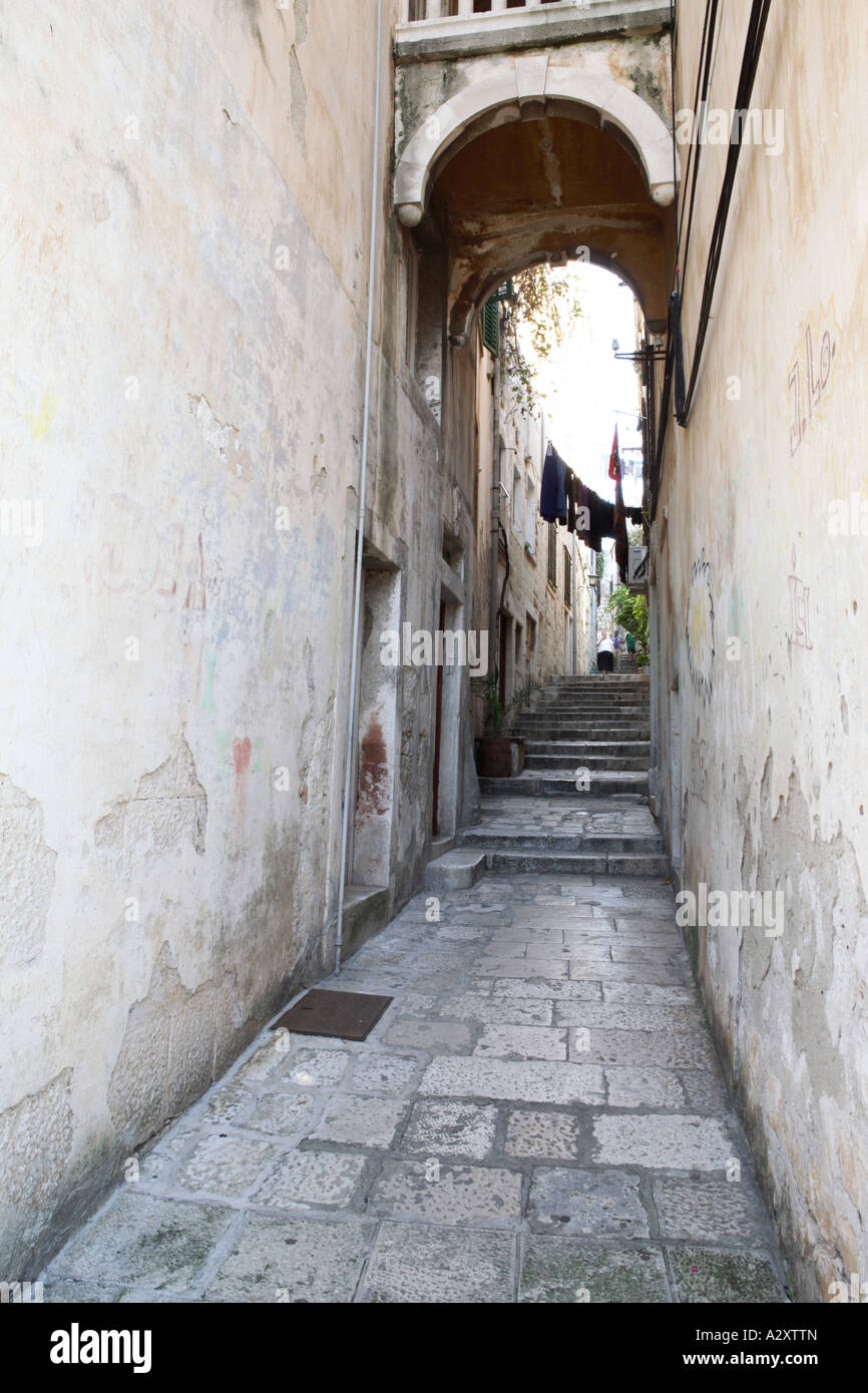 An old and narrow stone street in Korcula Old Town, Croatia Stock Photo ...