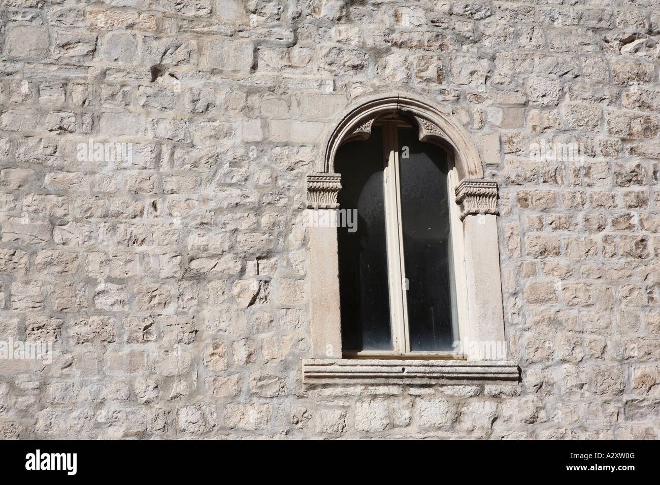 A stone masonry window in Korcula Old Town, Croatia Stock Photo - Alamy