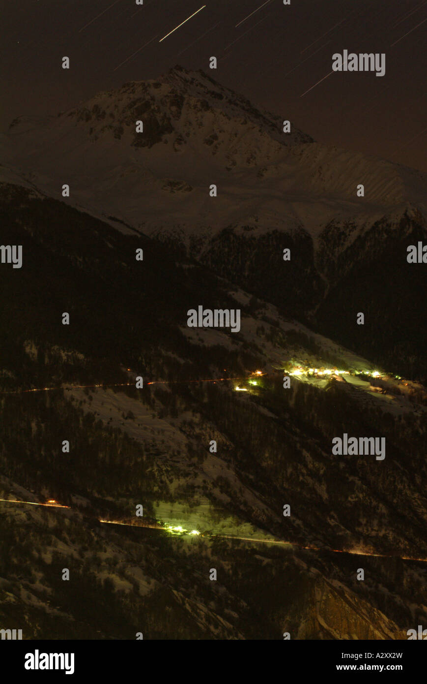 Stars falling down. Mountains covered with snow. Val d'Hérens. Le ...