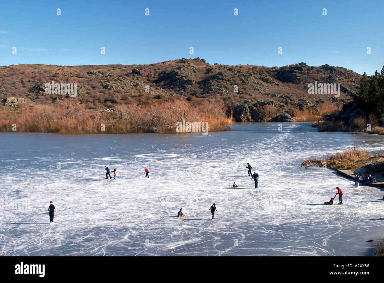 Ice Skating on Lower Mannorburn Dam near Alexandra Central Otago South ...