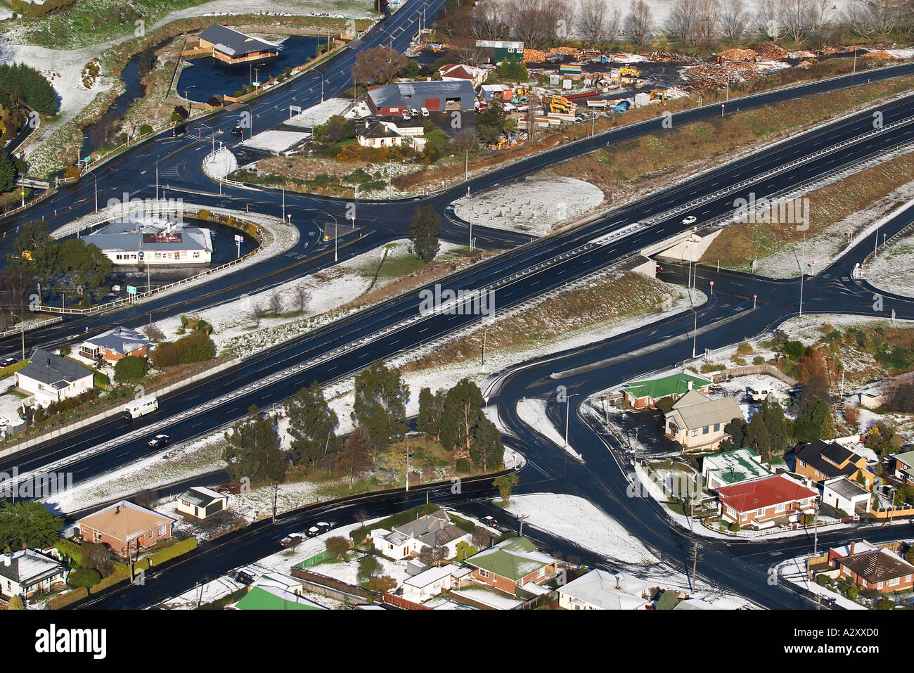 Southern Motorway and snow Dunedin South Island New Zealand aerial ...
