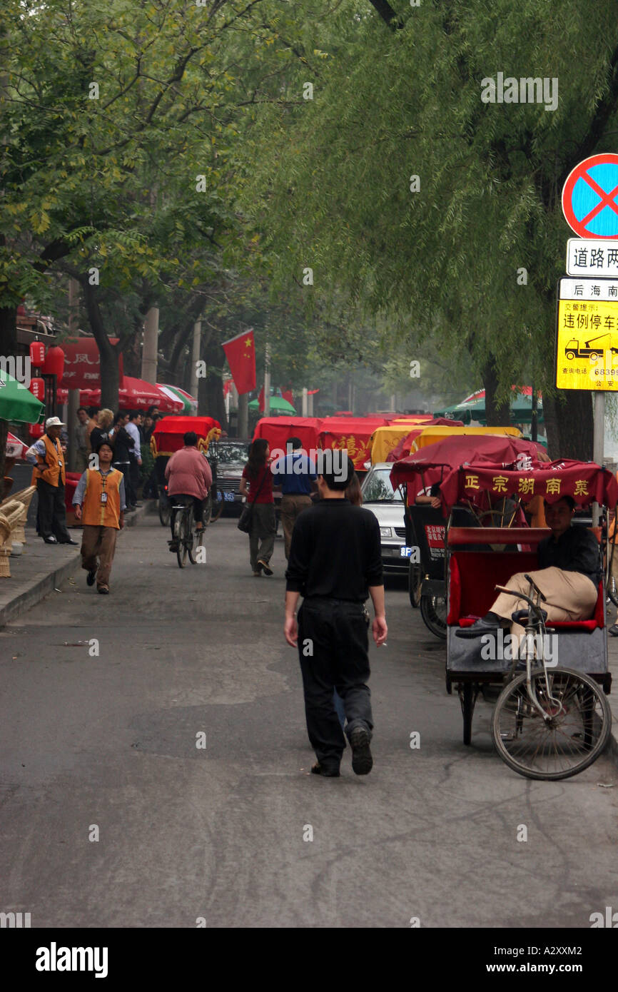 Rickshaw ride hutongs hi-res stock photography and images - Alamy