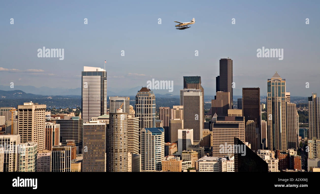 Seaplane flying over skyscrapers Seattle USA Stock Photo - Alamy