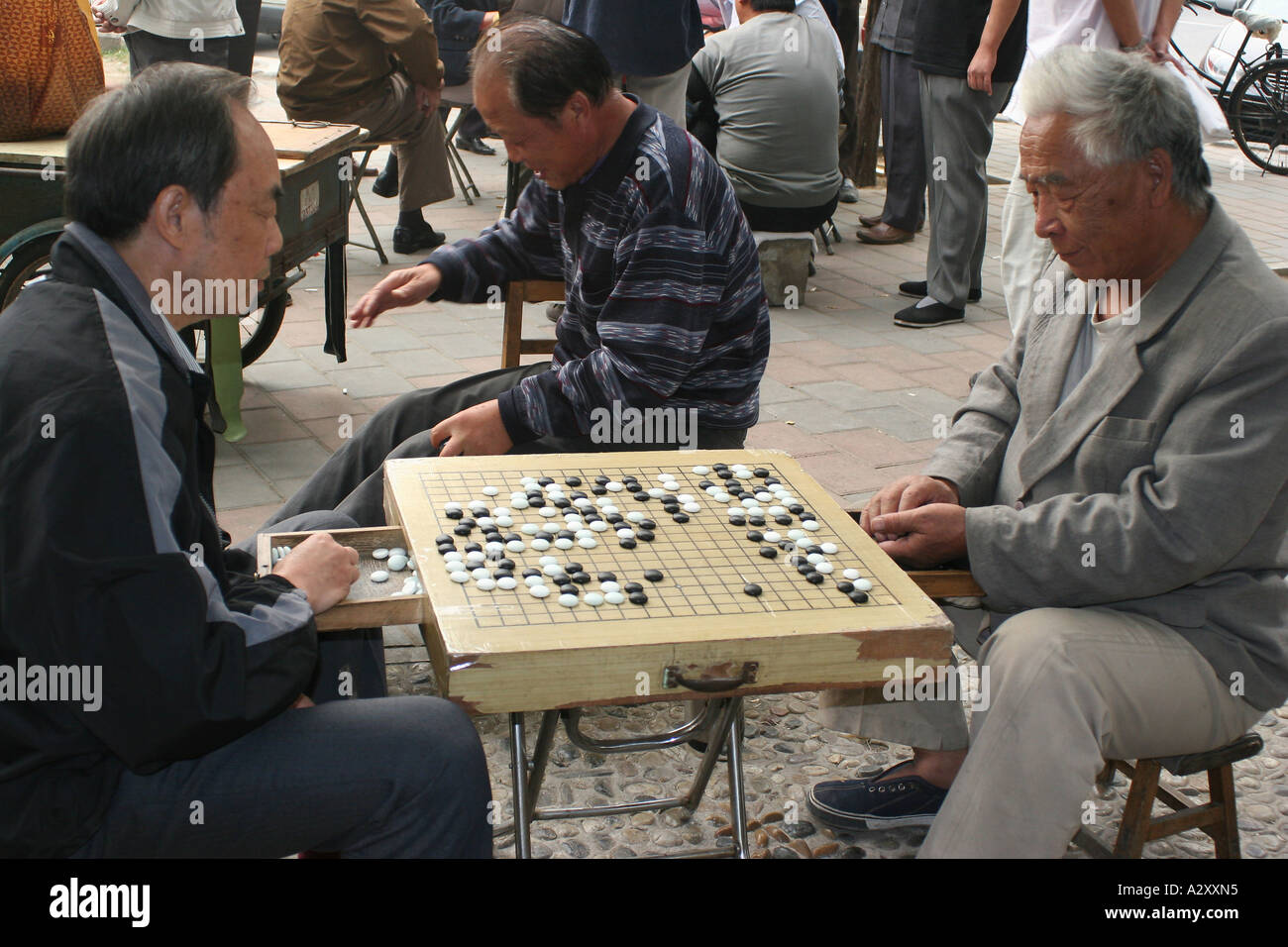 Playing go strategic board hi-res stock photography and images - Alamy