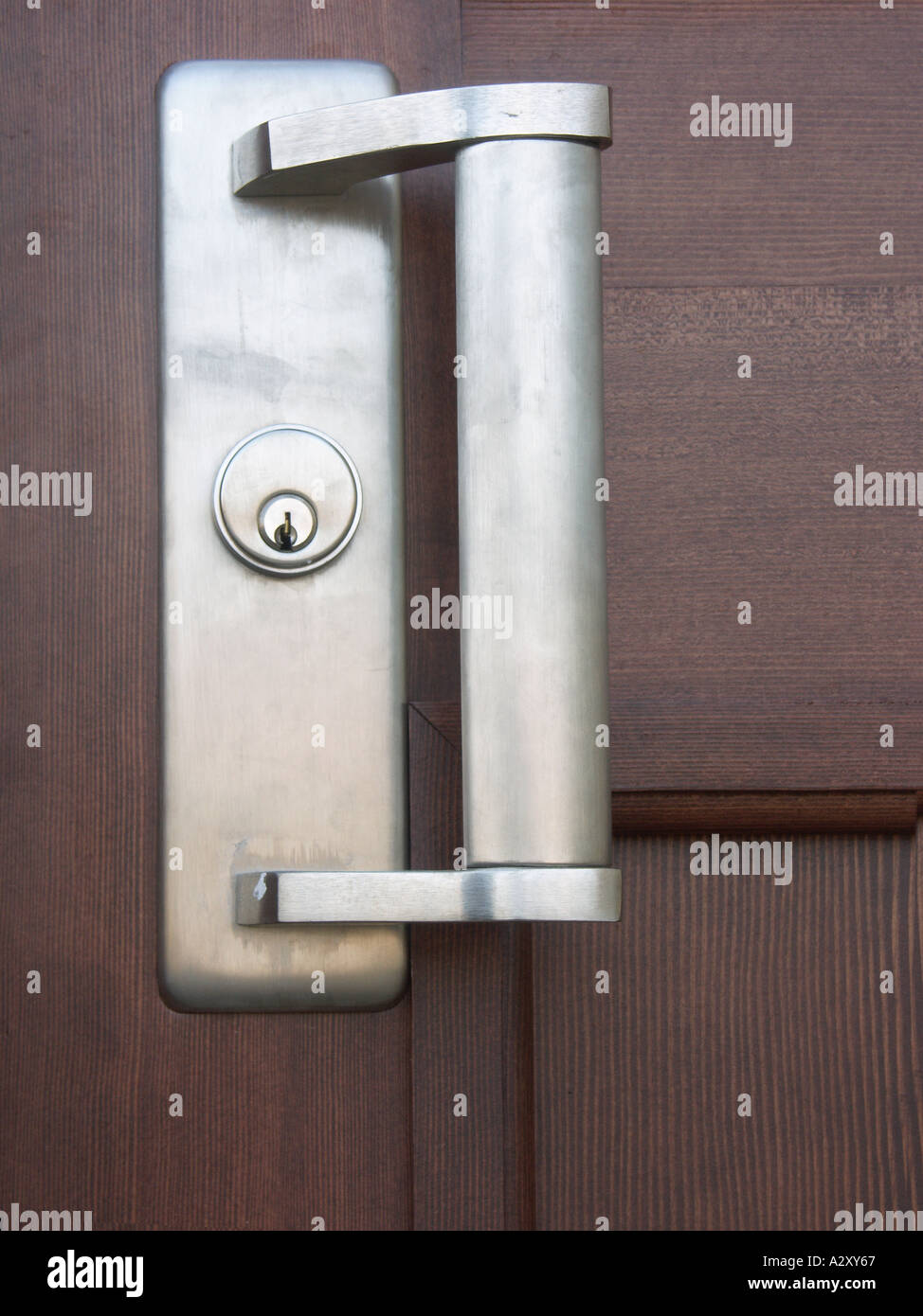 Door handle with lock Stock Photo - Alamy