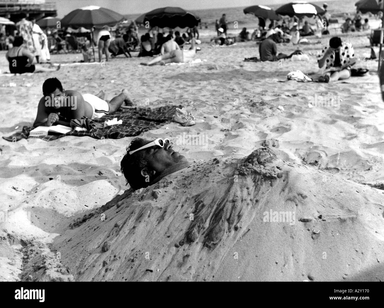 Waiting on the beach Black and White Stock Photos & Images - Alamy