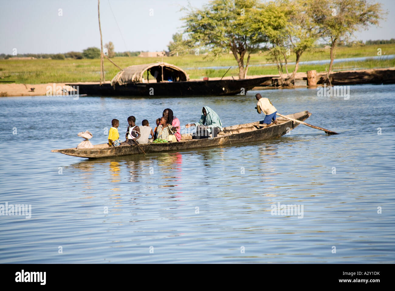 Pirogues on the Niger river at the port of Korioume from the ferry on ...