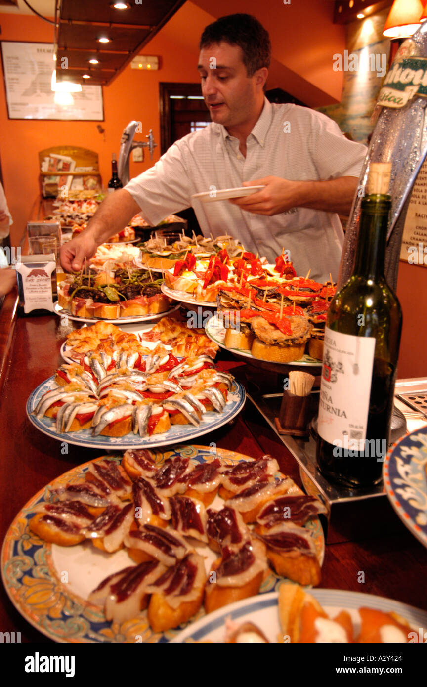 Eating tapas at a bar in San Sebastian, Spain Stock Photo - Alamy