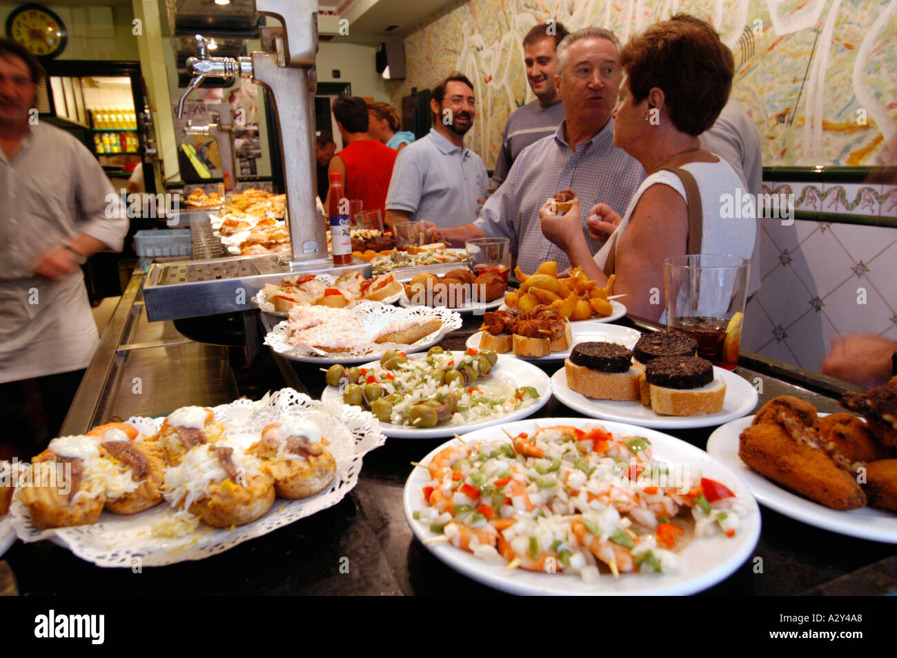 Eating tapas at a bar in San Sebastian, Spain Stock Photo - Alamy