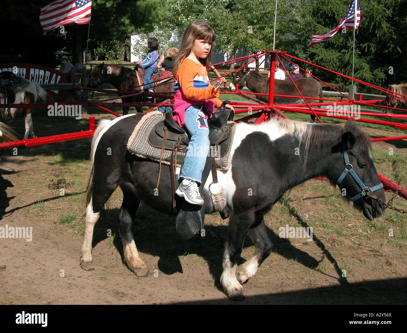 Child riding pony hi-res stock photography and images - Alamy