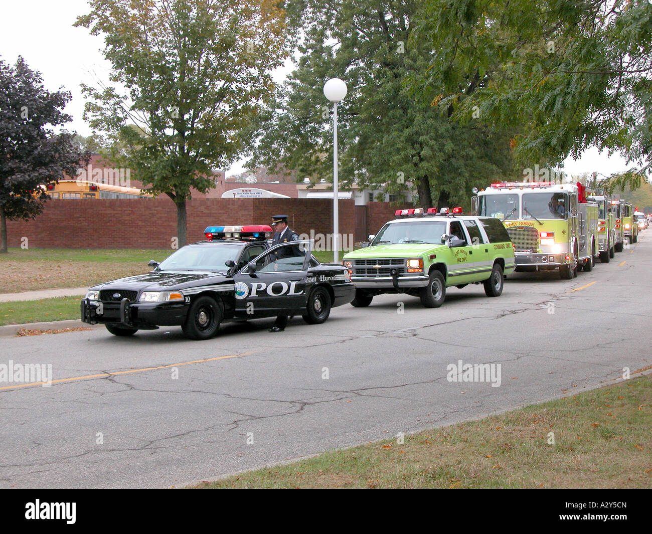 Local fire fighters and policemen attend funeral of fire chief Stock ...
