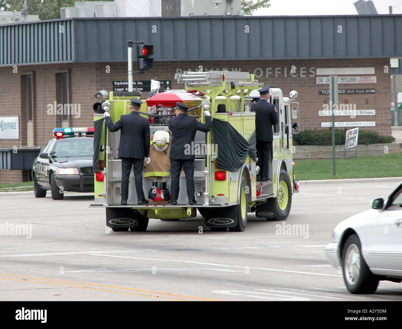 Local fire fighters and policemen attend funeral of fire chief Stock ...