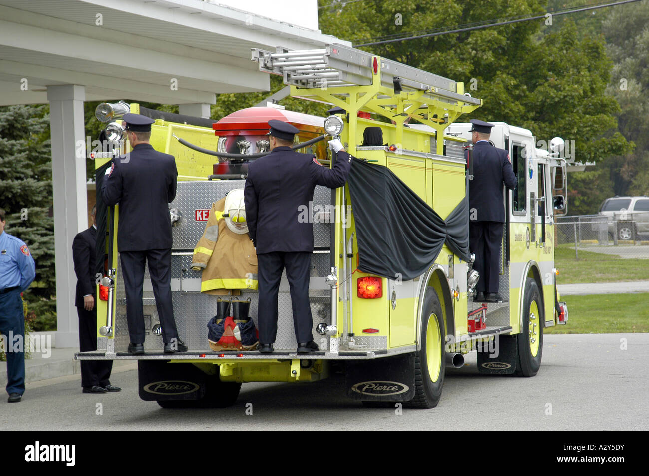 Local fire fighters and policemen attend funeral of fire chief Stock ...