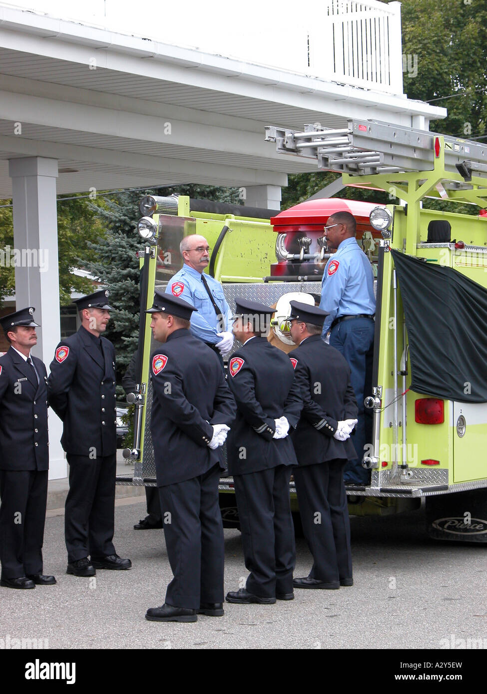 Local fire fighters and policemen attend funeral of fire chief Stock ...