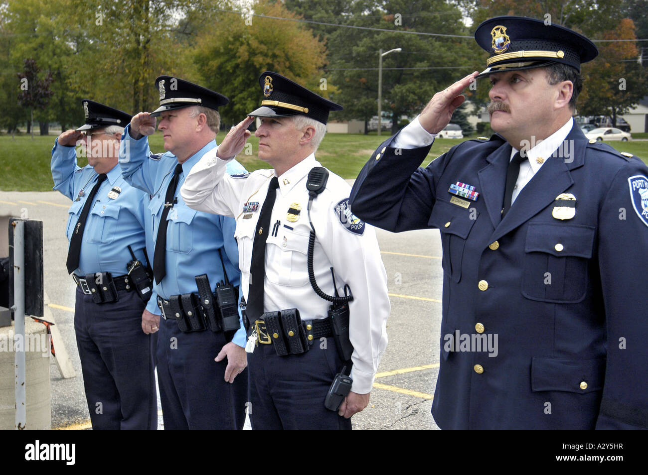 Local fire fighters and policemen attend funeral of fire chief Stock ...