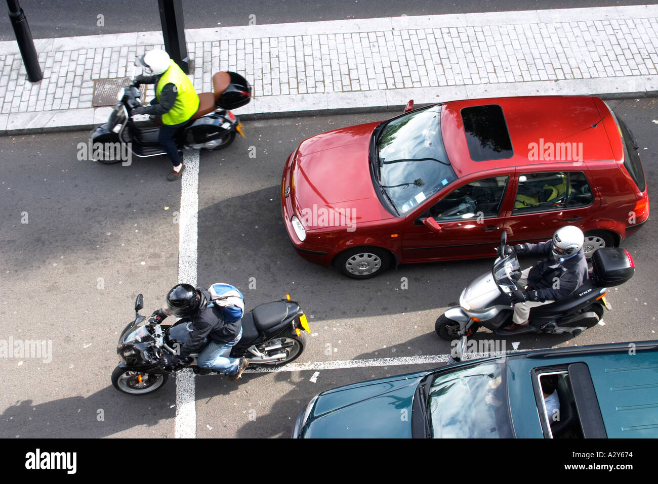 Motorbikes in traffic london hi-res stock photography and images - Alamy