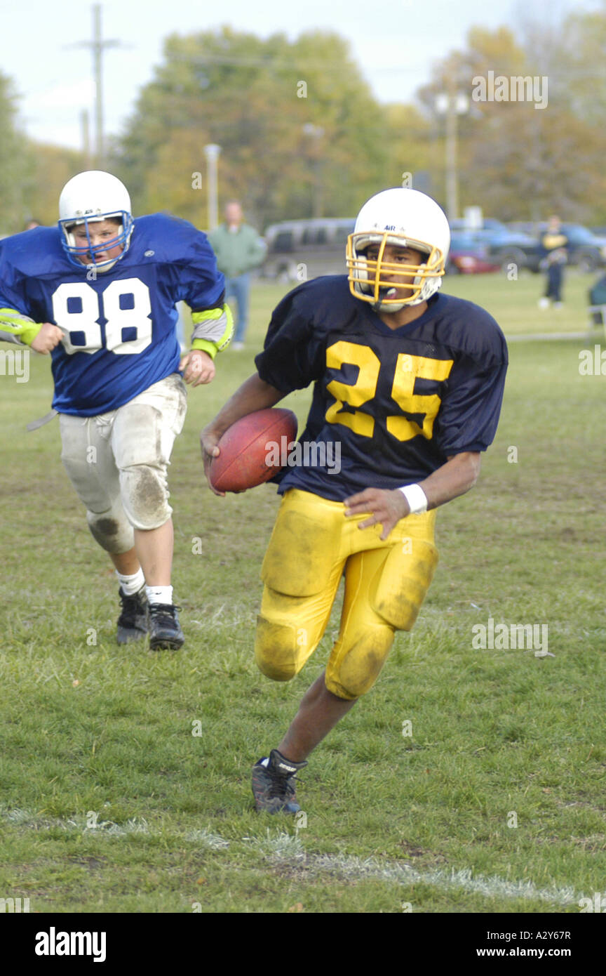 Middle school football action Stock Photo - Alamy
