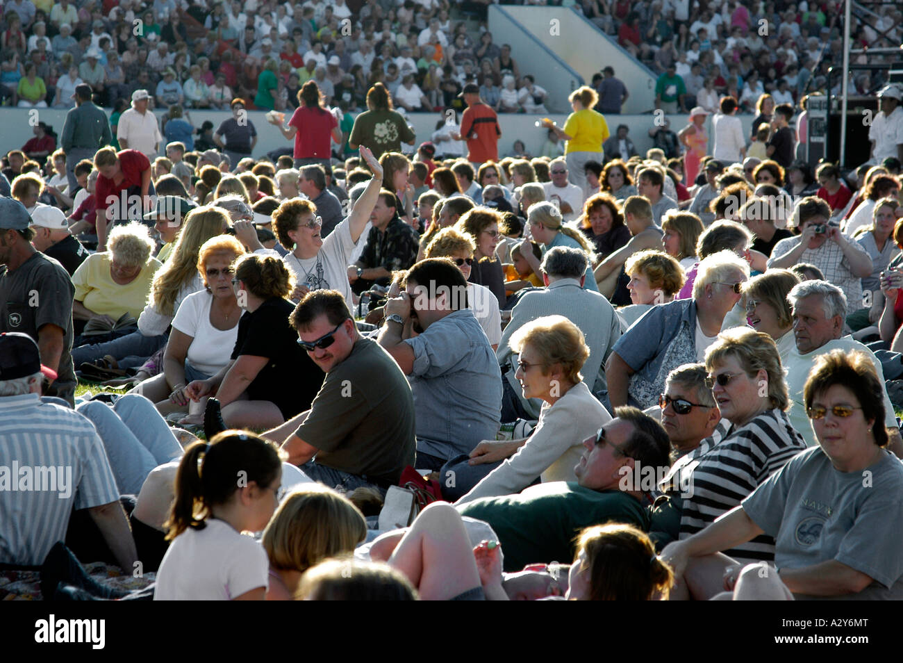 Crowd of people attend an outdoor concert event Stock Photo - Alamy