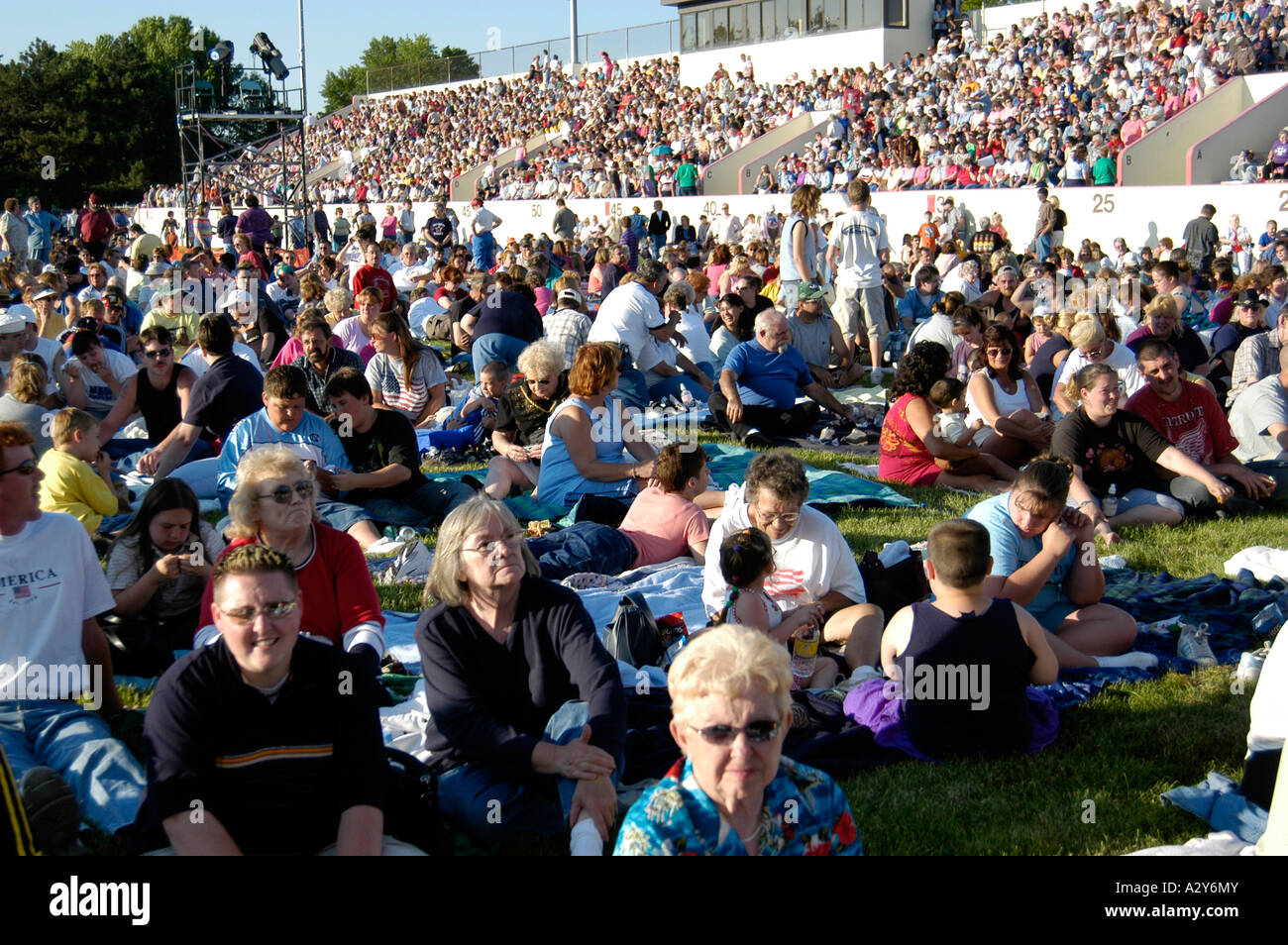 Crowd of people attend an outdoor concert event Stock Photo - Alamy