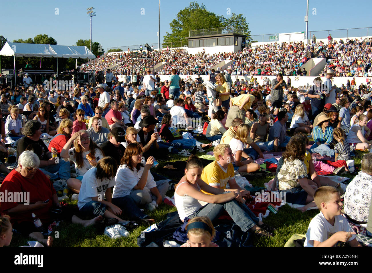 Crowd of people attend an outdoor concert event Stock Photo - Alamy