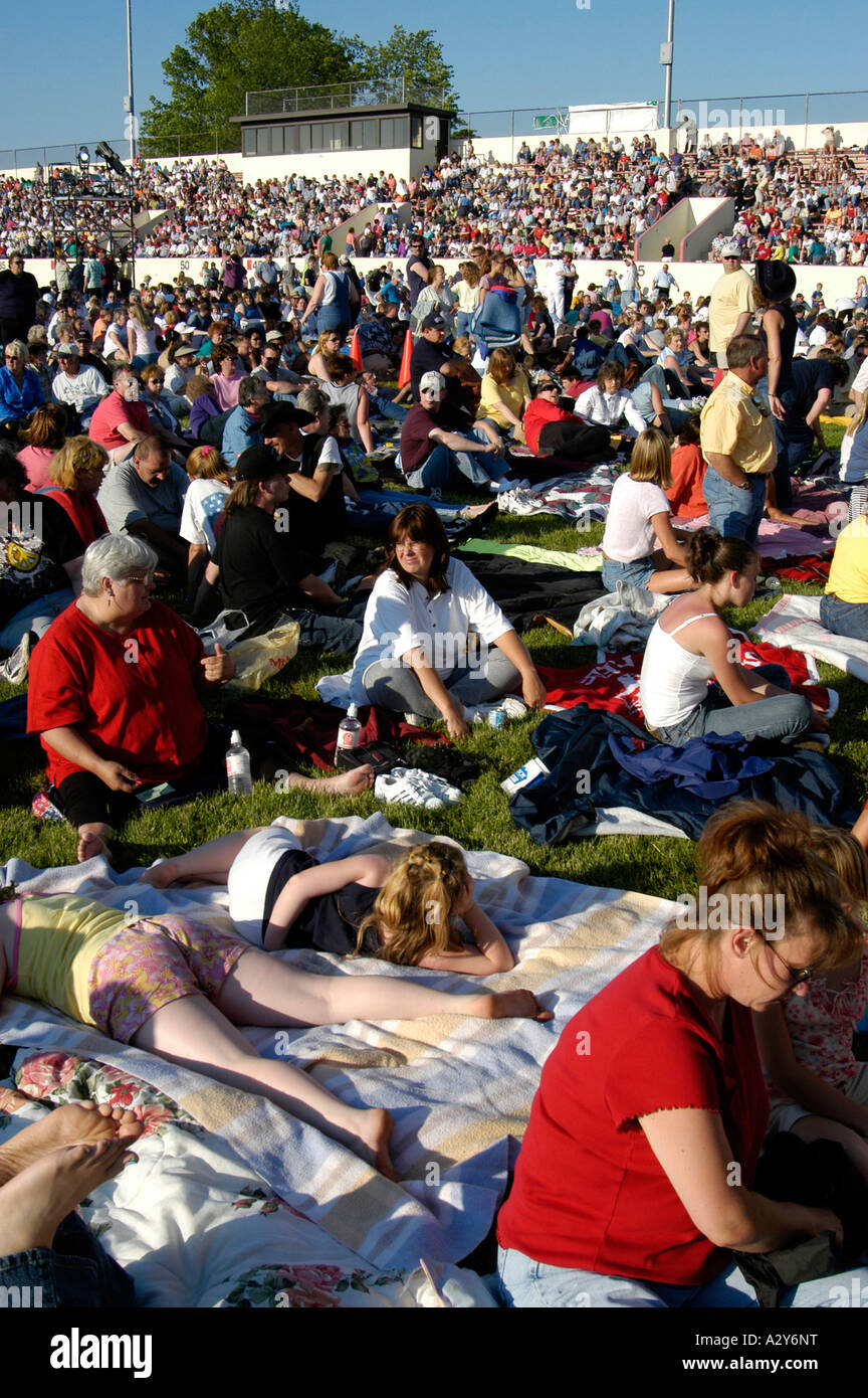 Crowd of people attend an outdoor concert event Stock Photo - Alamy
