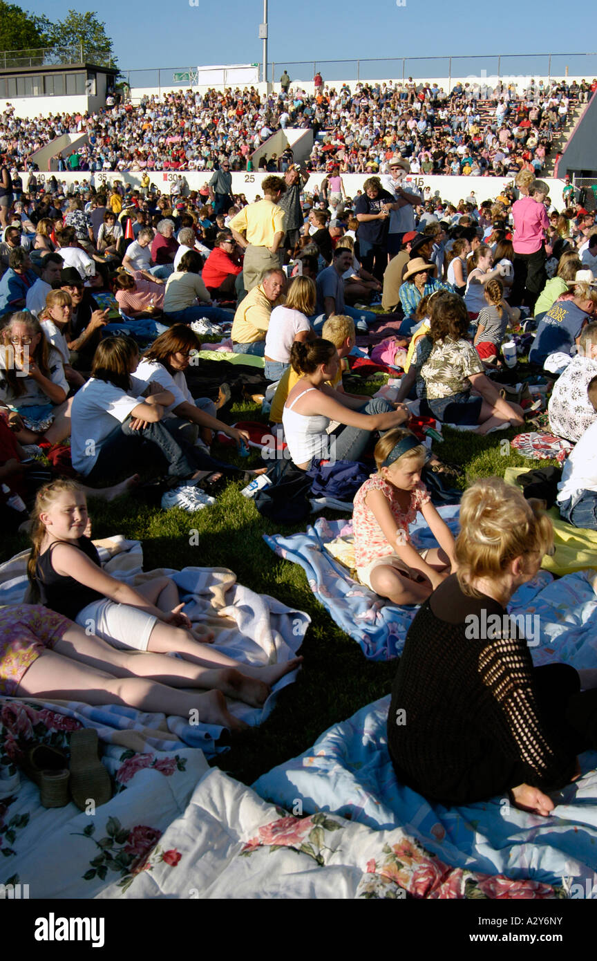 Crowd of people attend an outdoor concert event Stock Photo - Alamy