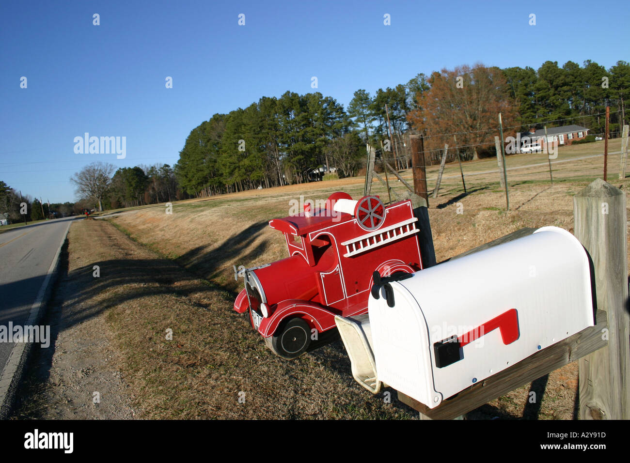 Fire engine mailbox on rural road Stock Photo - Alamy