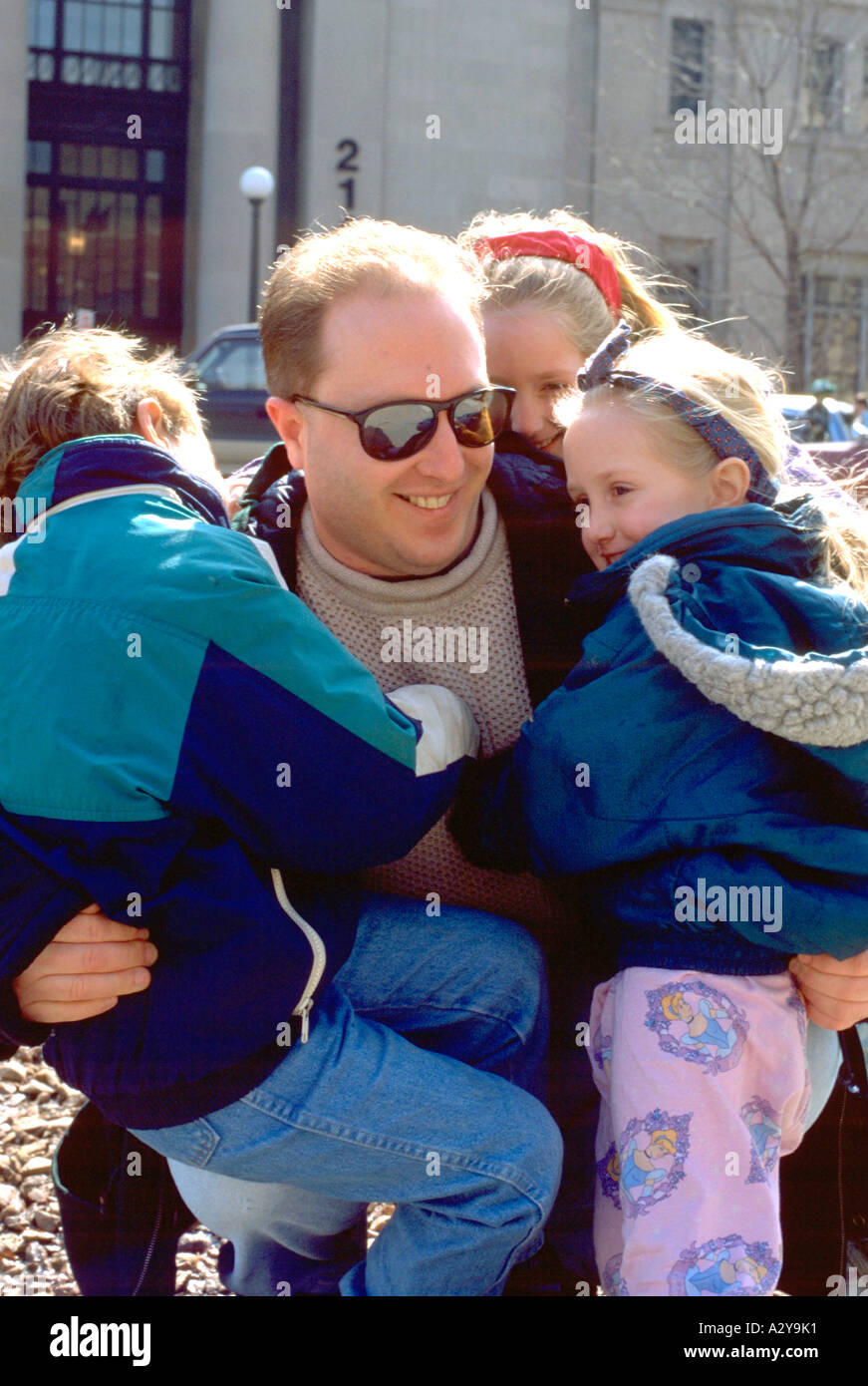 Dad holding his daughters at Saint Patrick's Day parade age 30 and 7 ...