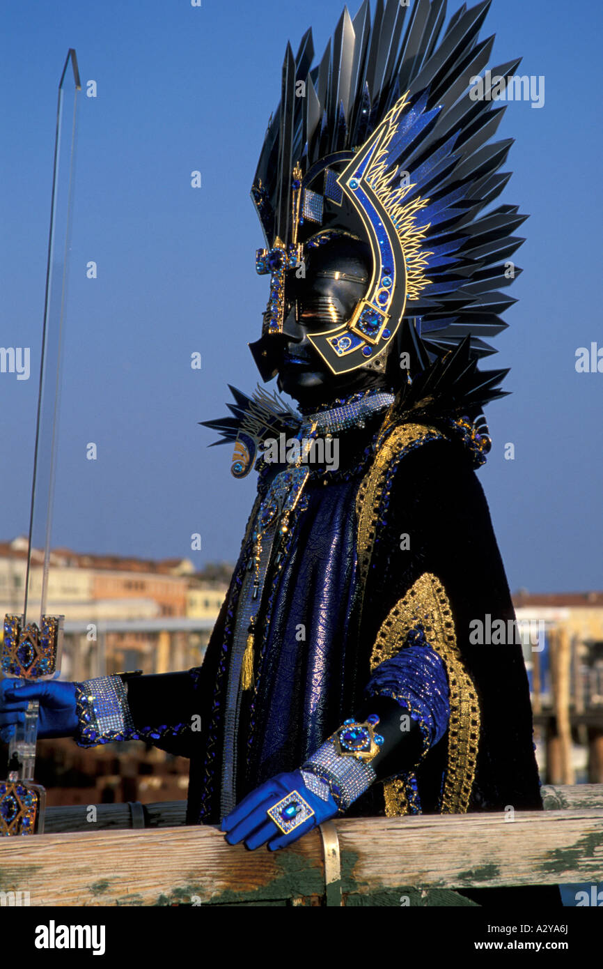 Extravagantly Black Costumed Warrior with a Lucite Sword for Carnevale ...
