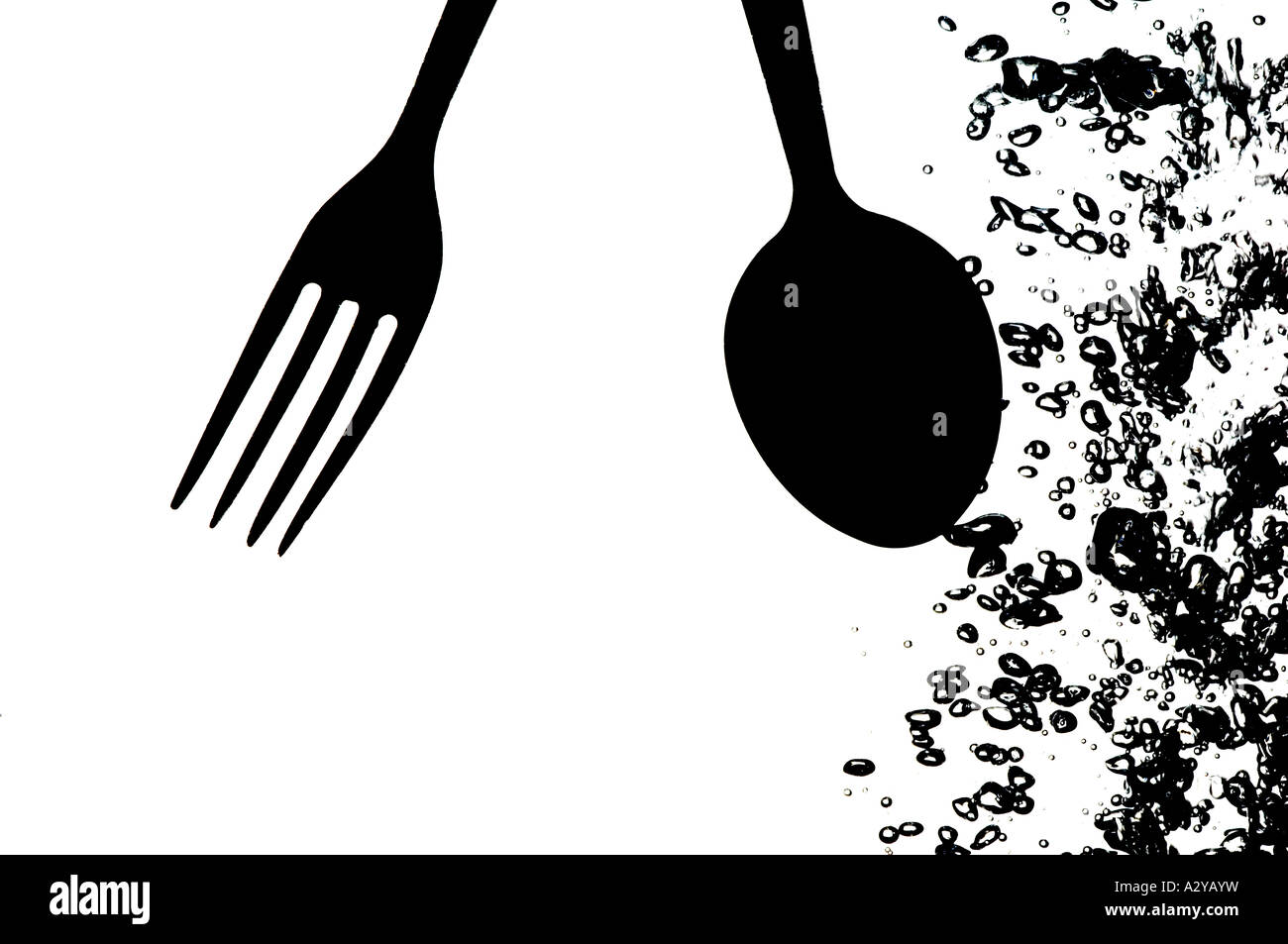 Eating utensils in water on a white background Stock Photo - Alamy